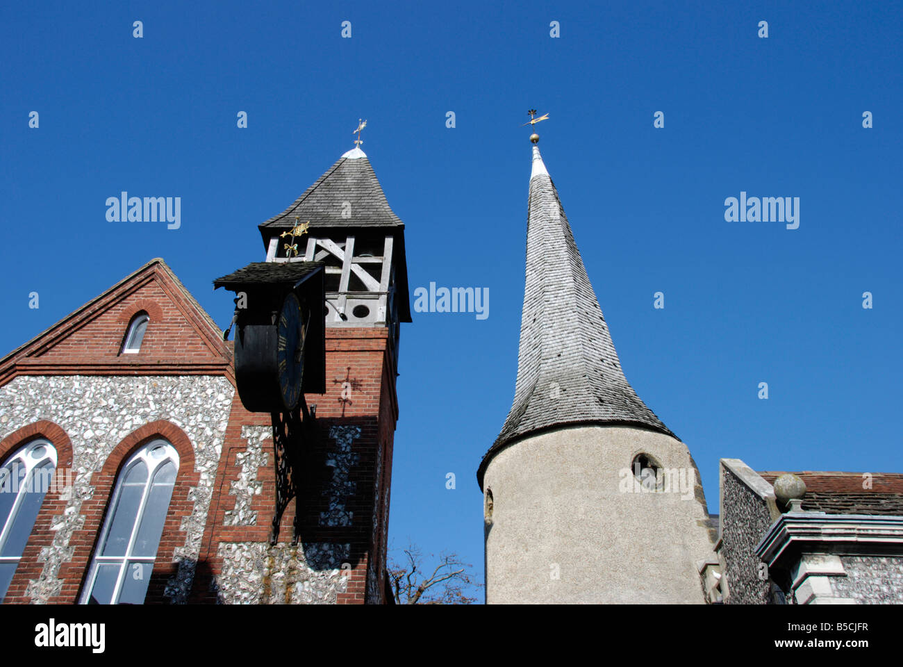 Twin spires of St Michael's Church High Street Lewes East Sussex ...