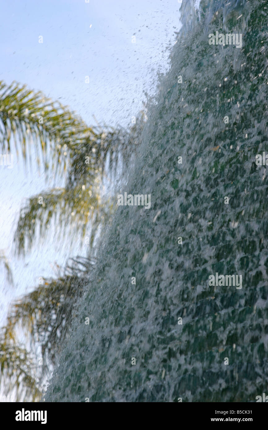 water volcano with a palm tree in background Stock Photo - Alamy