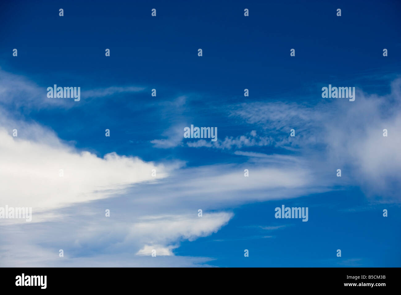 Picture of a beautiful blue sky with scattered clouds Stock Photo - Alamy