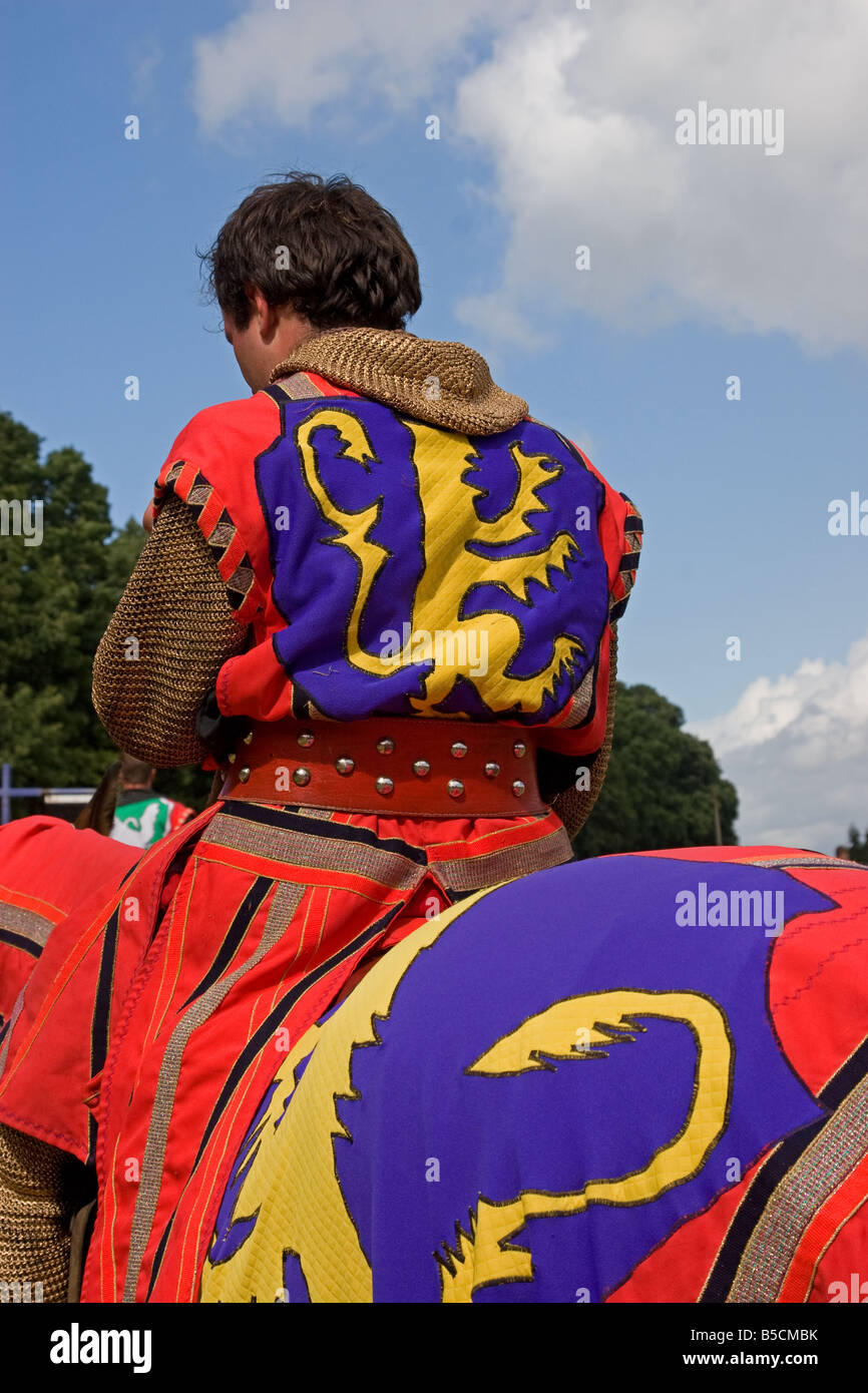 Rear view of a knight on horse at a joust Stock Photo - Alamy