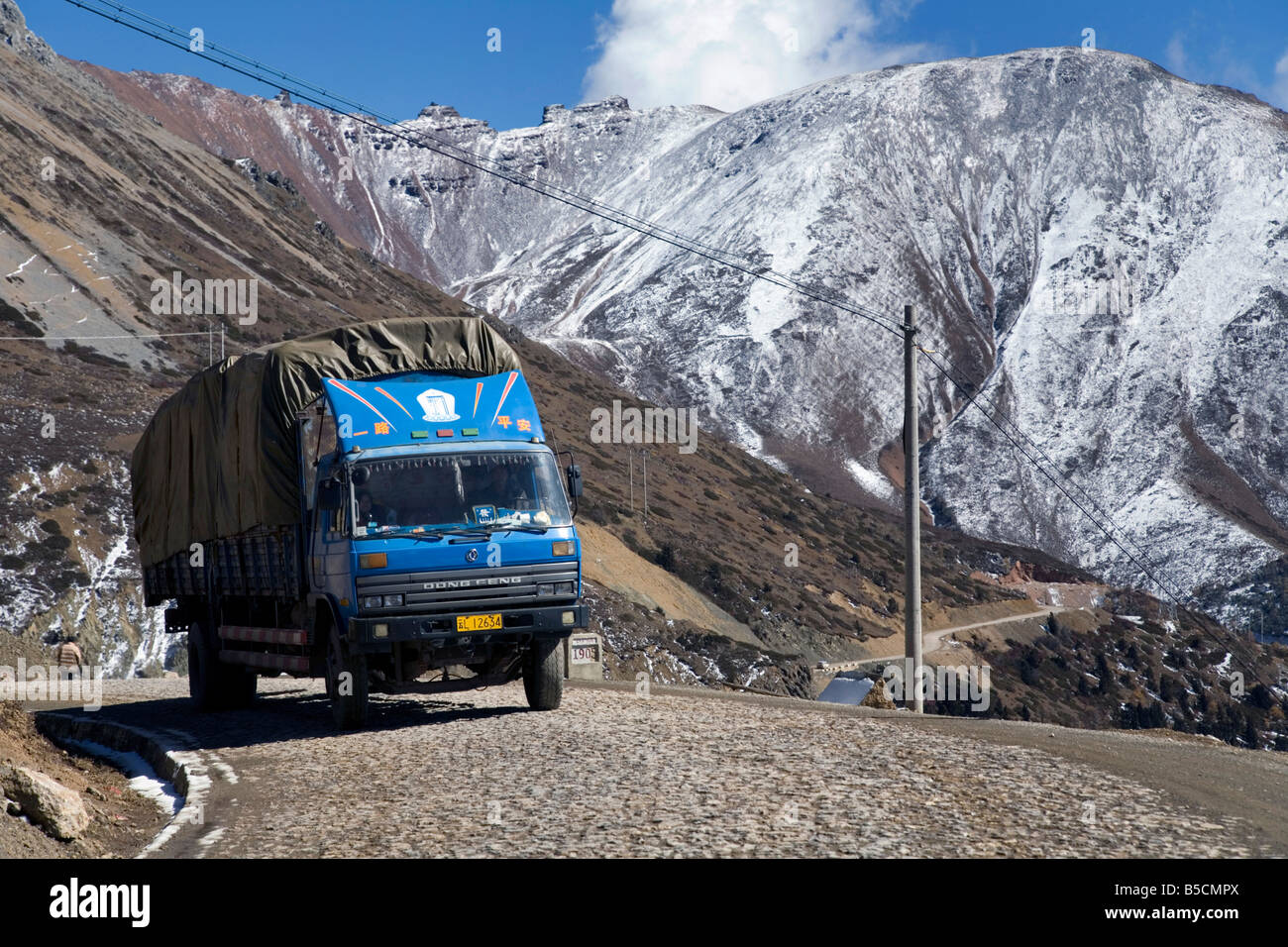 Traffic over a 4000 meter pass between Deqin and Shangri La Yunnan ...