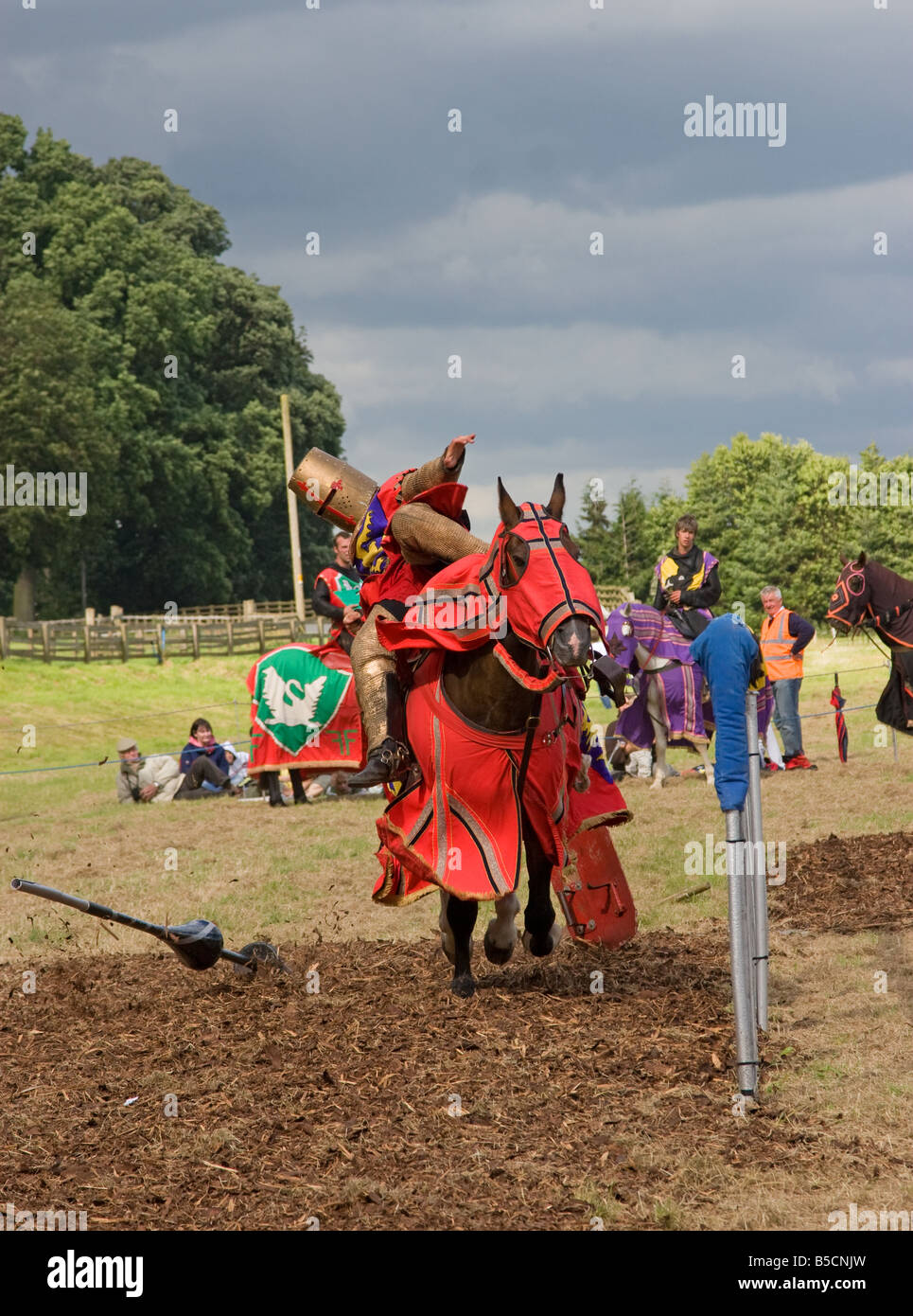 Knight falling off horse at a joust Stock Photo - Alamy