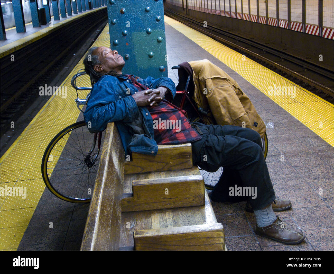 Black man sleeping on subway hi-res stock photography and images - Alamy