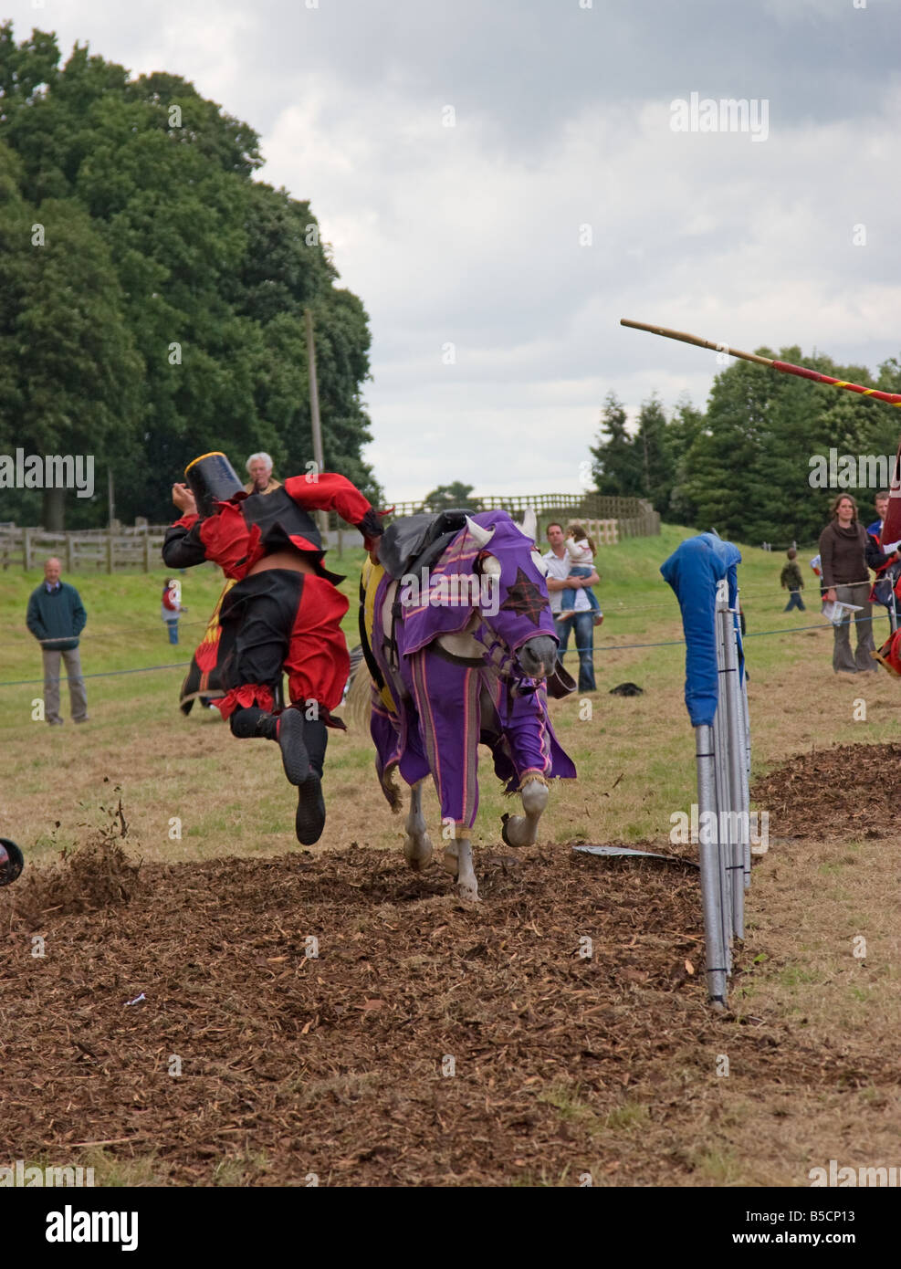 Knight falling off his horse at a joust Stock Photo - Alamy
