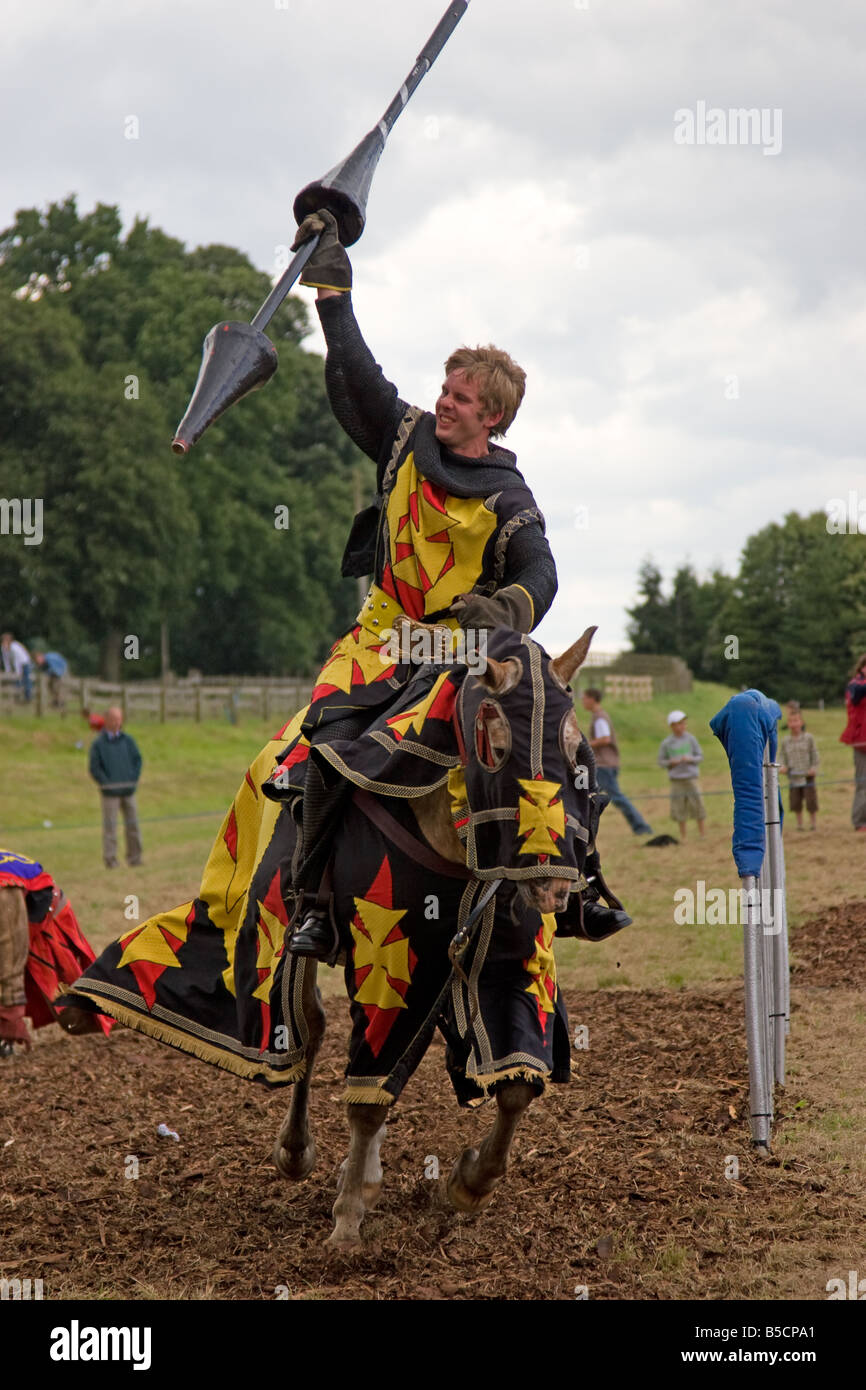Knight on horse at a joust saluting the crowd Stock Photo - Alamy