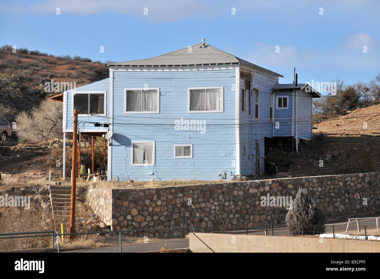 A typical wooden house on different levels in Globe Arizona Stock Photo ...