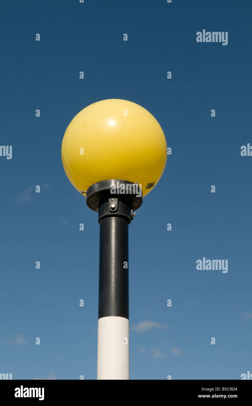yellow globe of a british Belisha beacon against a clear blue sky Stock ...