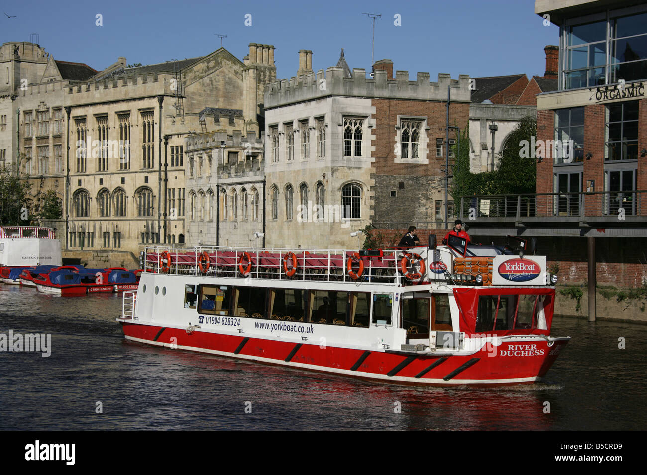 City of York, England. A Yorkboat river cruise boat transiting the ...