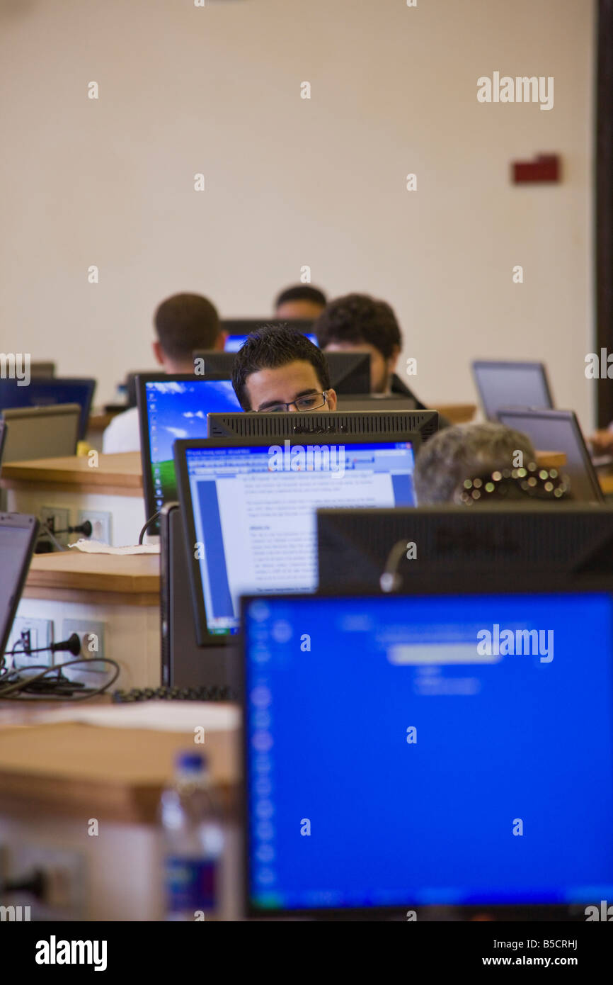 students at computer desks in library, new campus, American University ...