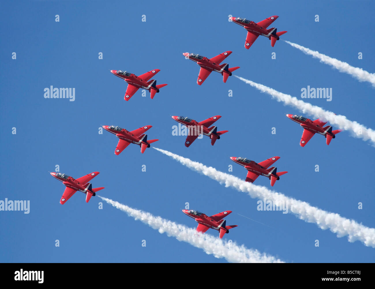 The Royal Air Force Red Arrows aerobatic team displaying skill ...