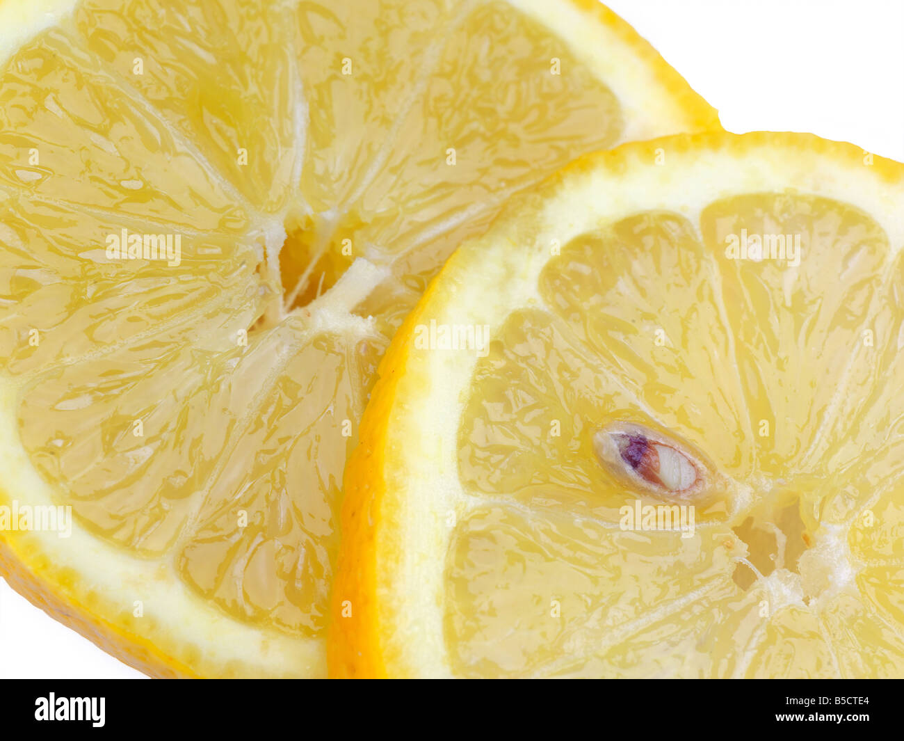 Lemon slices isolated Stock Photo - Alamy