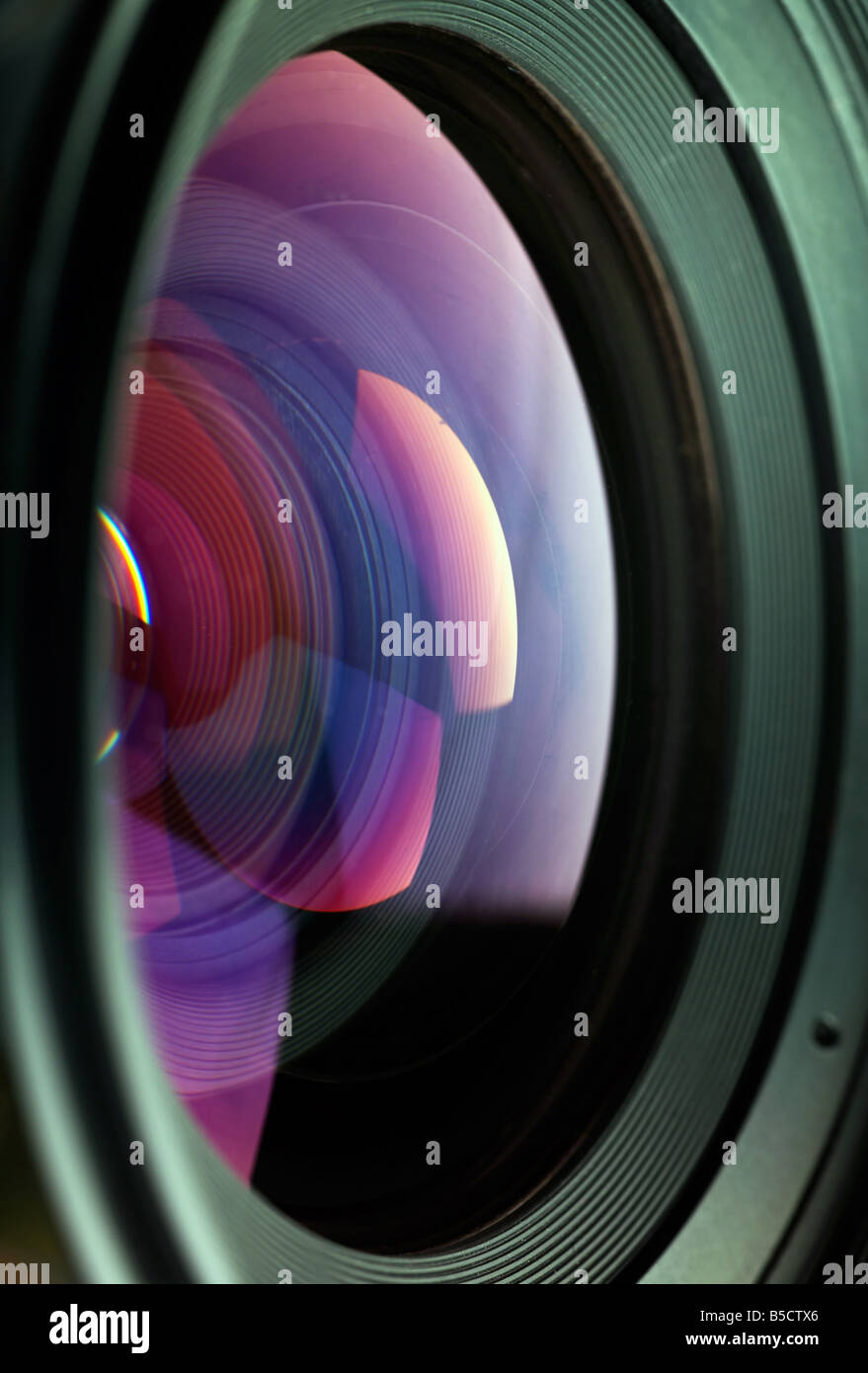 Lens with refracted light and rainbow colors caused by refraction and ...