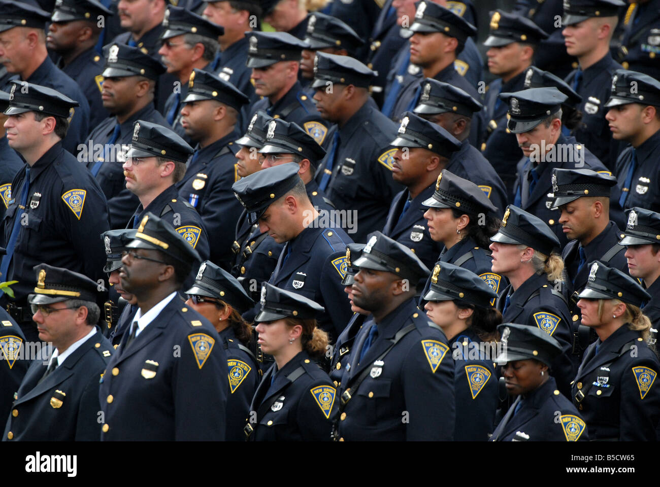 Police officers mourn the loss of one of their own who was killed ...