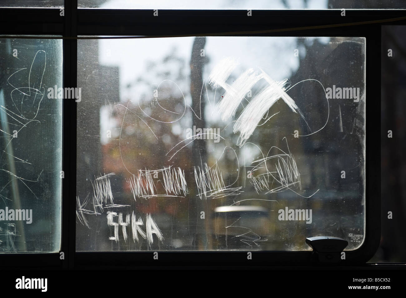 Scratched bus window Stock Photo - Alamy
