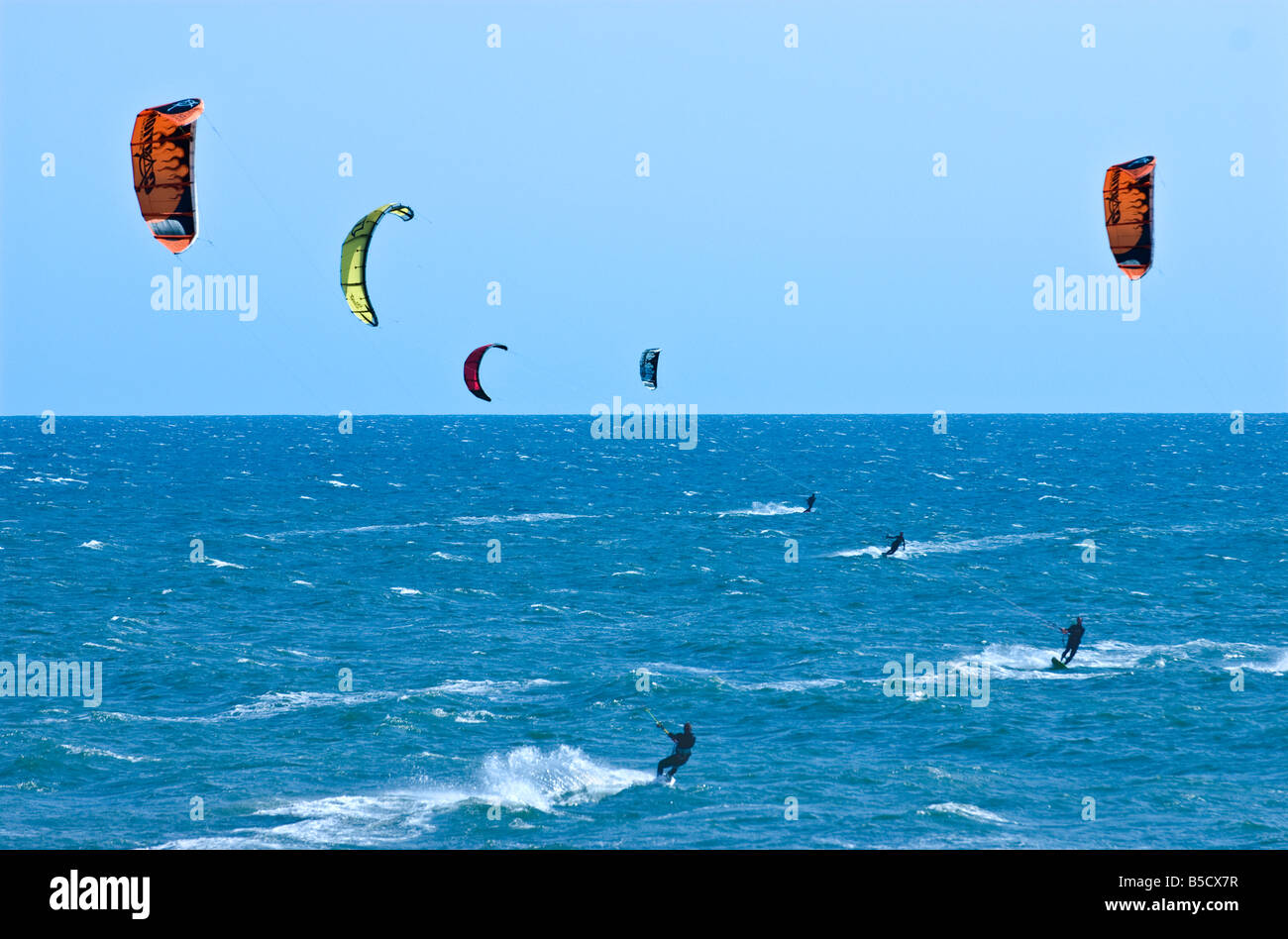 Four kite surfers off the Northern California Coast at Maddell Beach ...