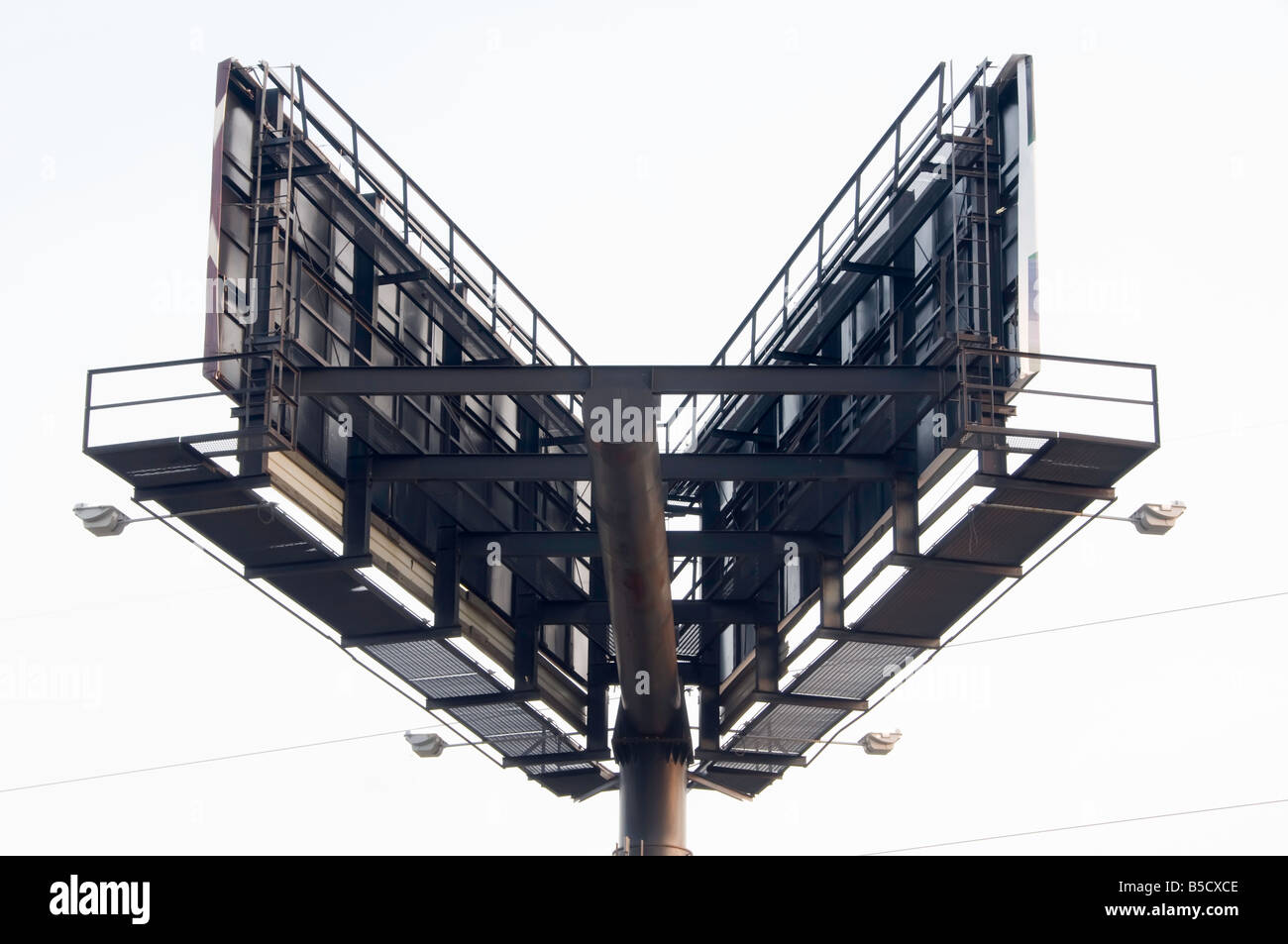 Two billboards on one pole Stock Photo - Alamy