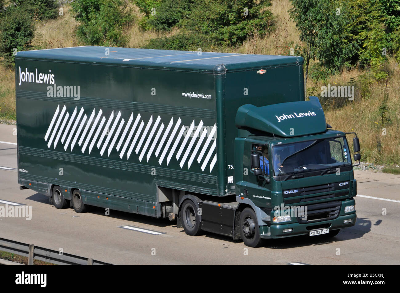M25 motorway John Lewis articulated DAF delivery lorry and trailer ...