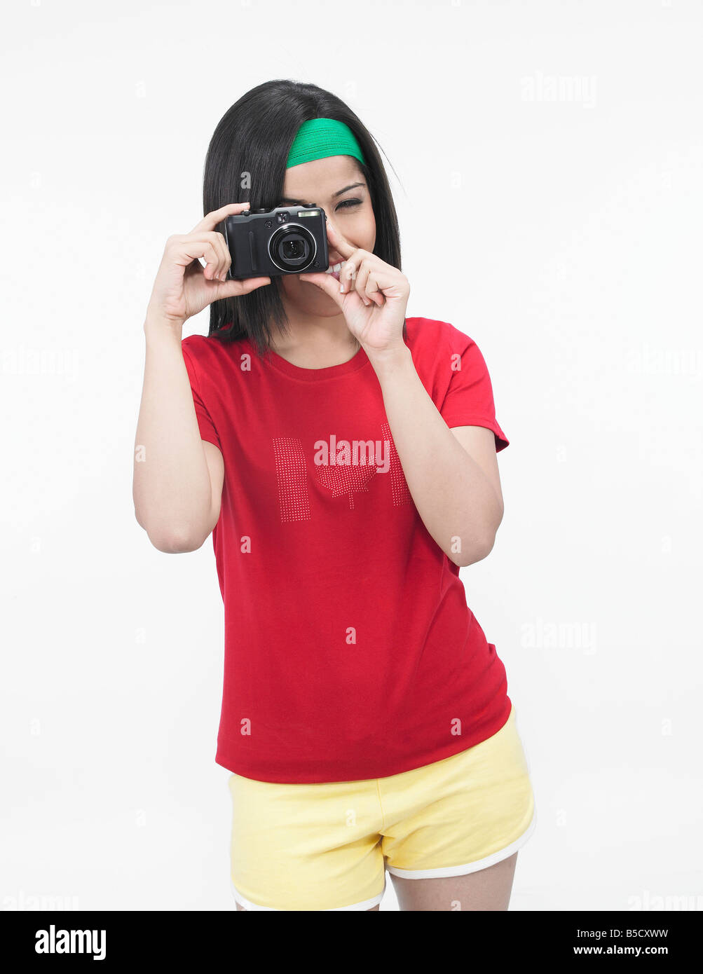 asian woman with a hot shot camera talking picture Stock Photo - Alamy