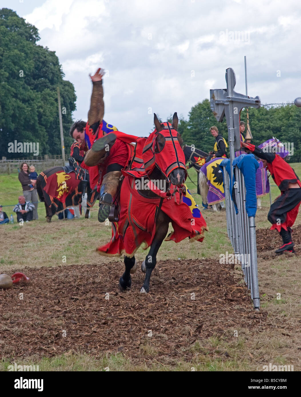 Knight falling off horse at a joust Stock Photo - Alamy