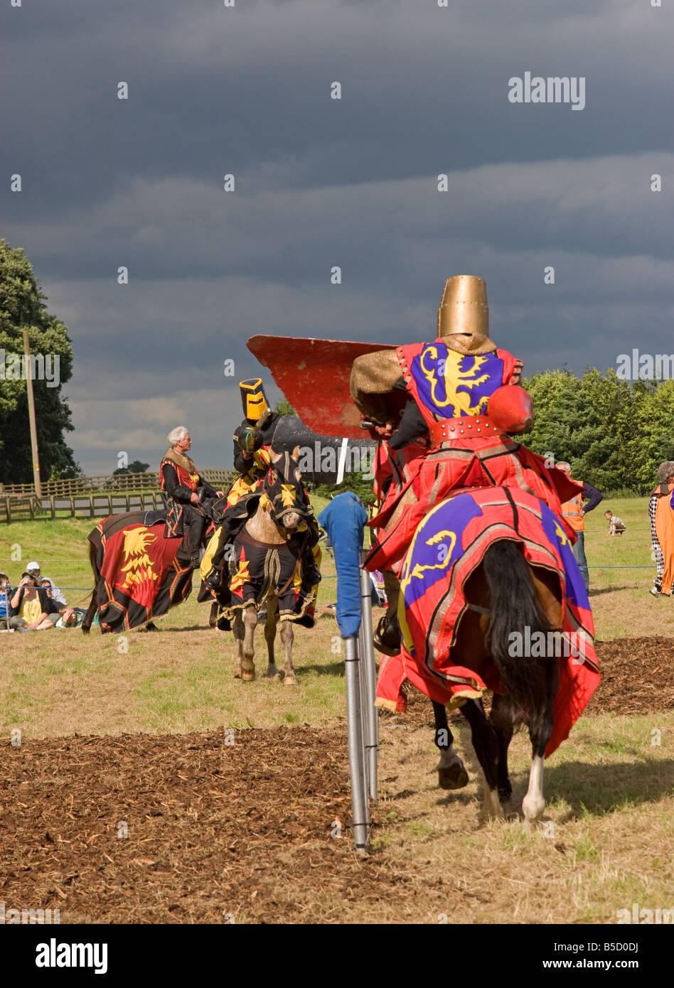 Knights charging at a joust Stock Photo - Alamy