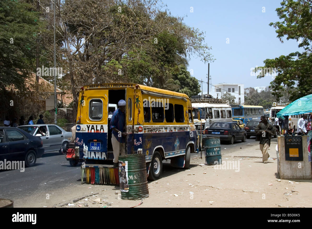 Traffic in Dakar Senegal with public transport bus run by Layene ...