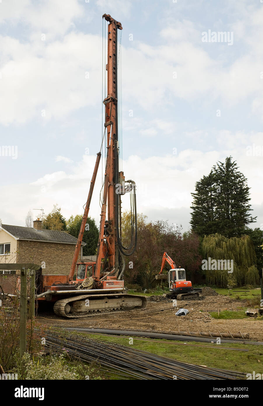 Drilling machine being manoeuvred into position ready to drill piles on ...