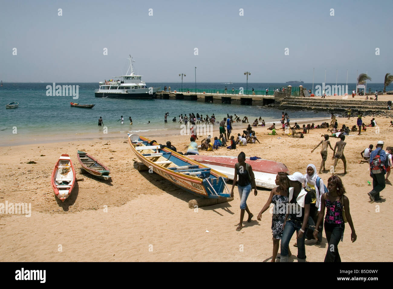 Gorée Island Dakar Senegal Bathers and fishing boats on beach Ferry in ...