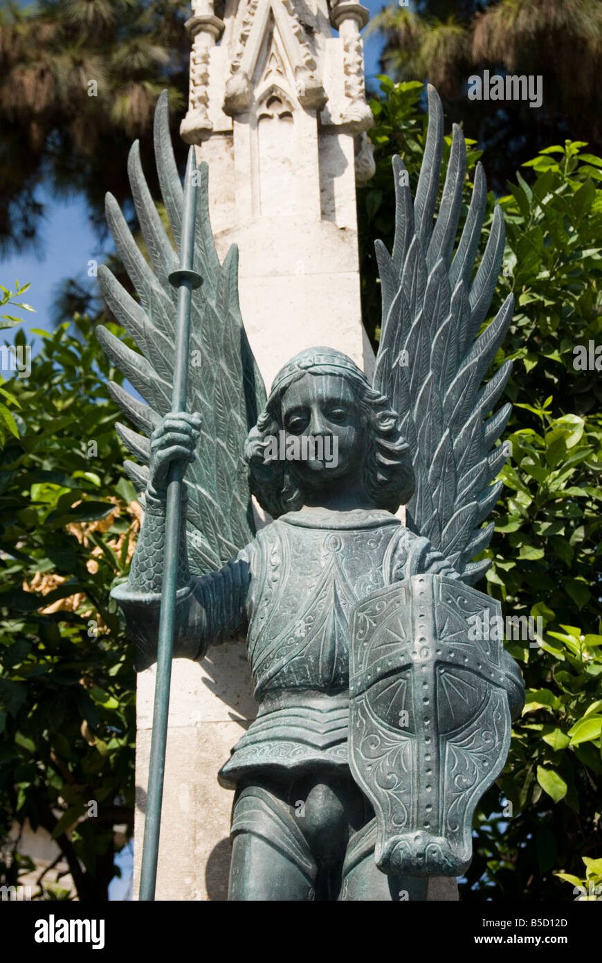 Bronze statue on the garden wall of Palacio de la Generalitat in the ...