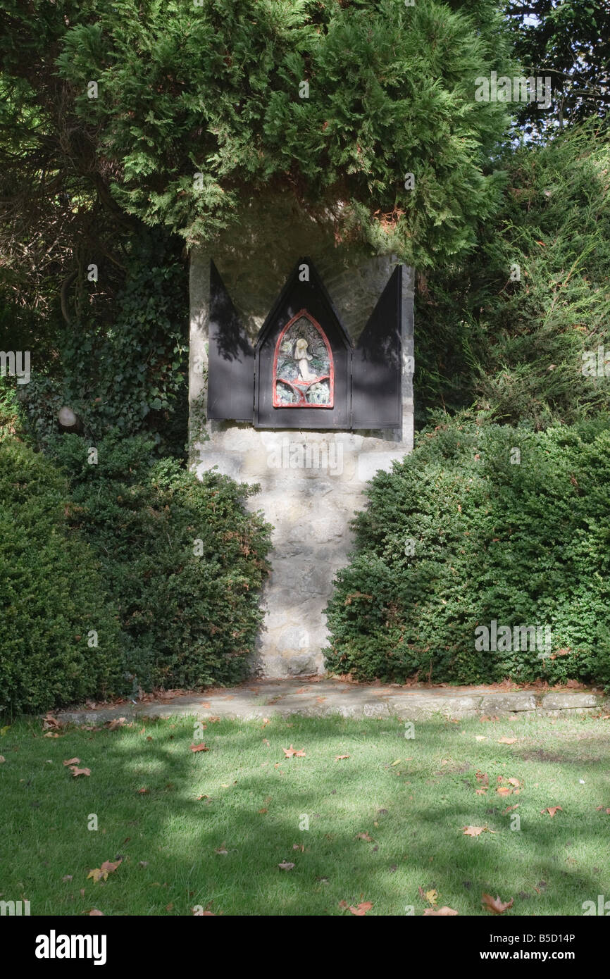 The Ascension in dappled light and partialy hidden by trees Rosary Walk ...