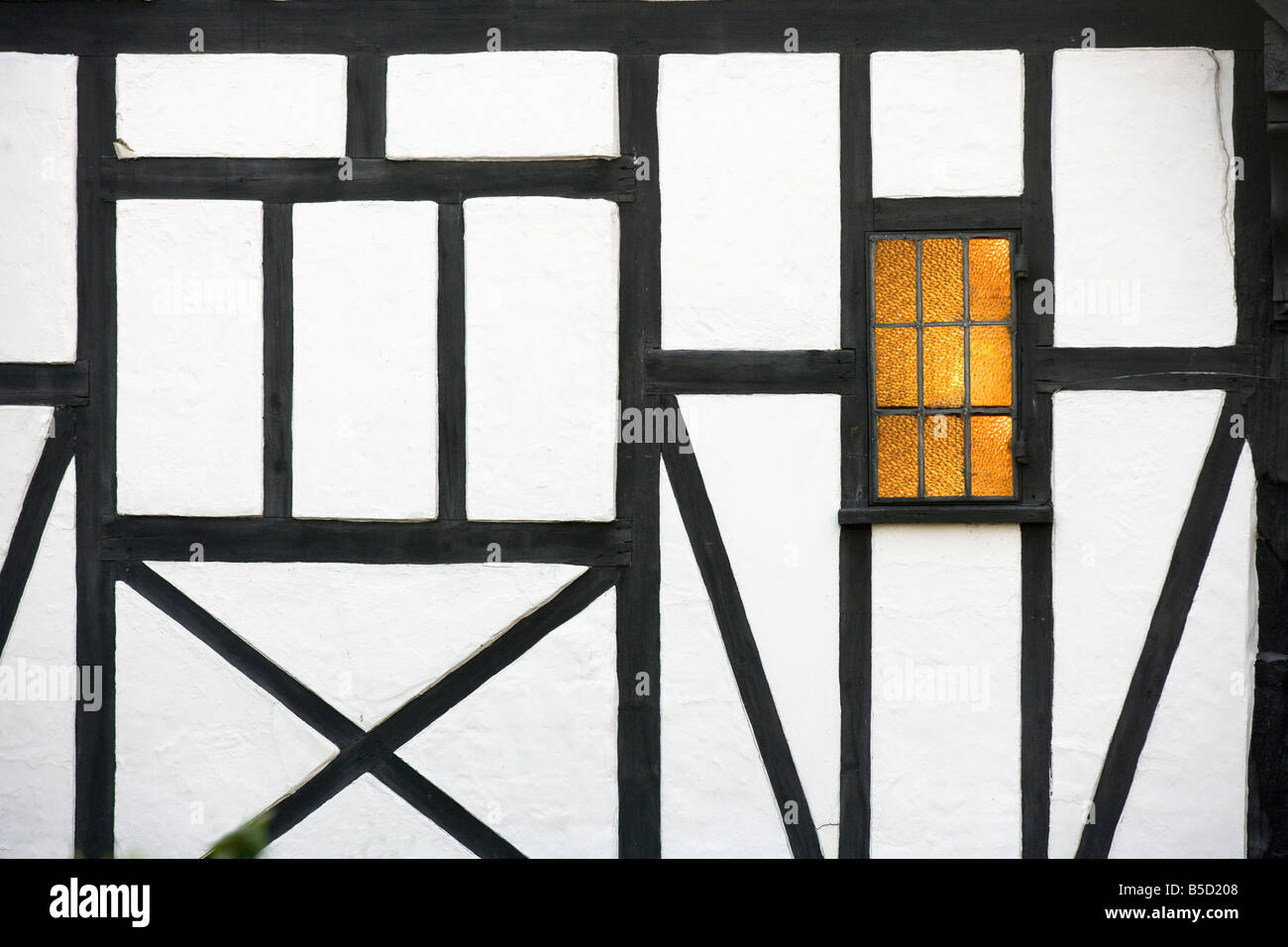 Old timber framed house with light in window, Chilham, Kent, England ...