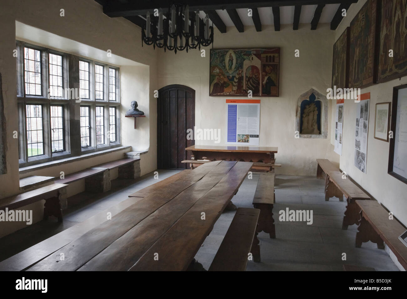 Ancient Dining table and benches at Aylesford Priory Kent Stock Photo ...