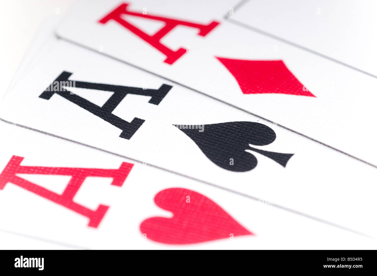 Macro of playing cards showing 3 aces Stock Photo - Alamy