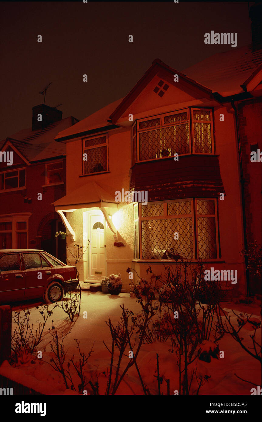 A house in the Crossways at night with snow on the ground in Heston ...