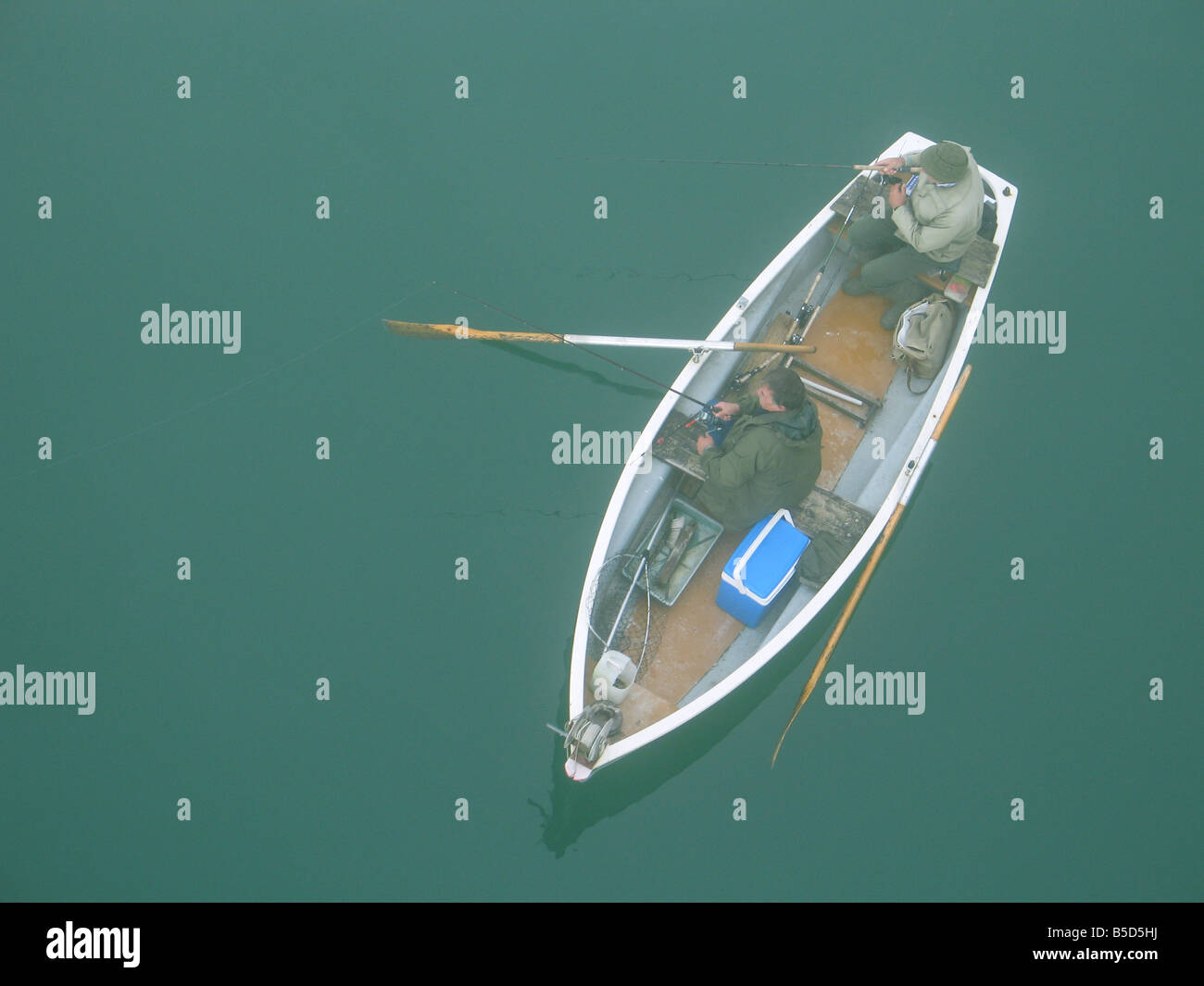 Aerial view of a fisherboat in the early morning mist Stock Photo - Alamy