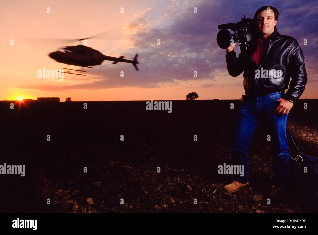 People working,TV cameraman with traffic helicopter Stock Photo - Alamy