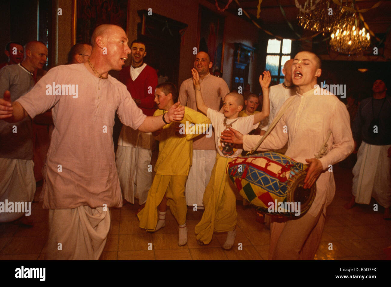Hare krishnas dancing England uk L Taylor Stock Photo - Alamy