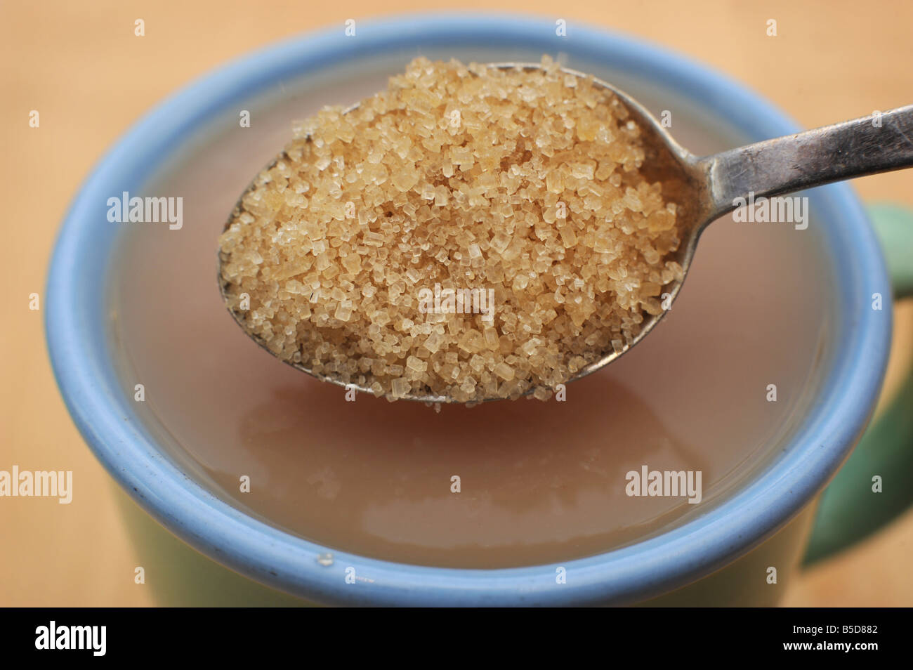 Sugar spoon tea adding hi-res stock photography and images - Alamy