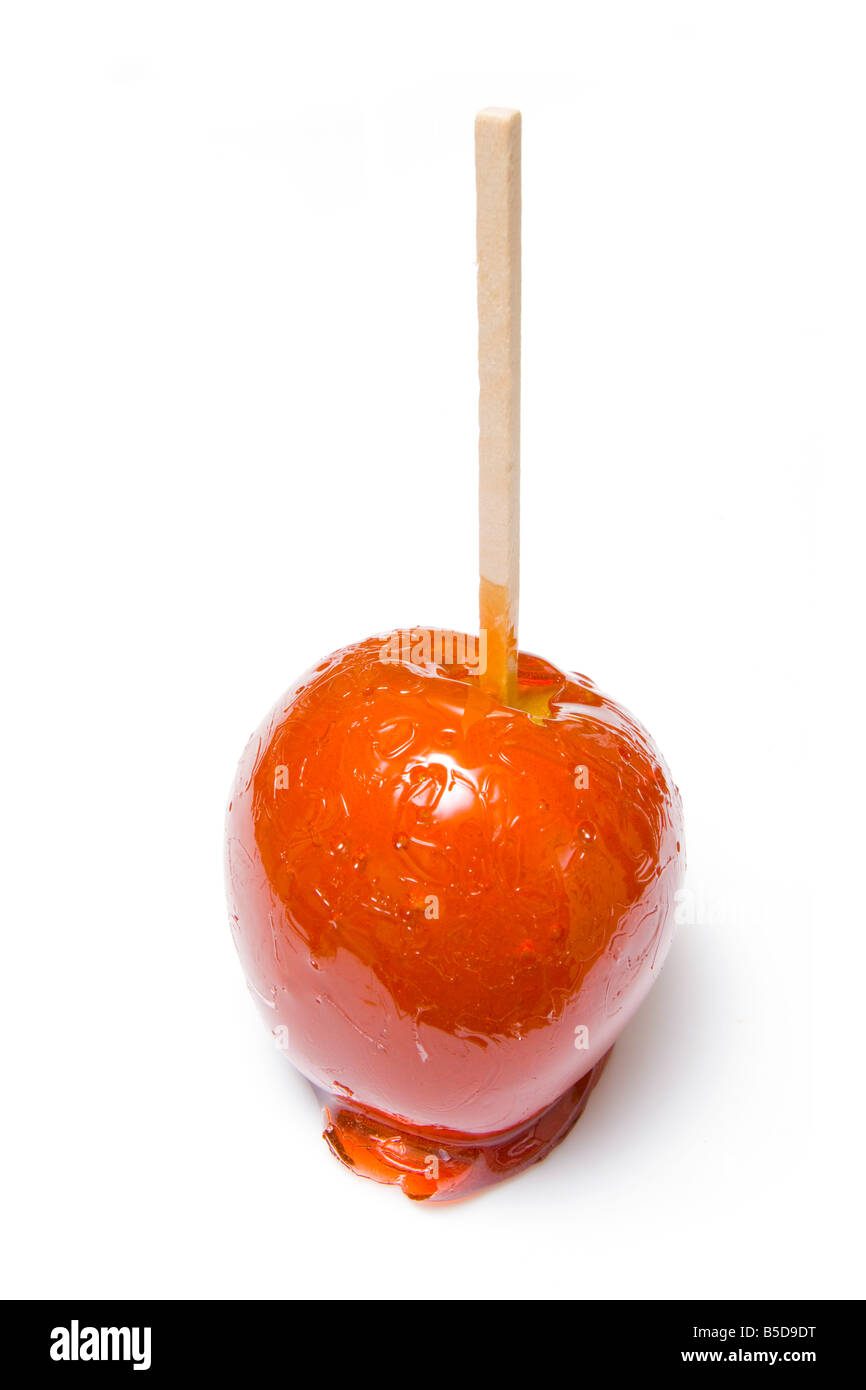 Toffee apple isolated on a white studio background Stock Photo - Alamy