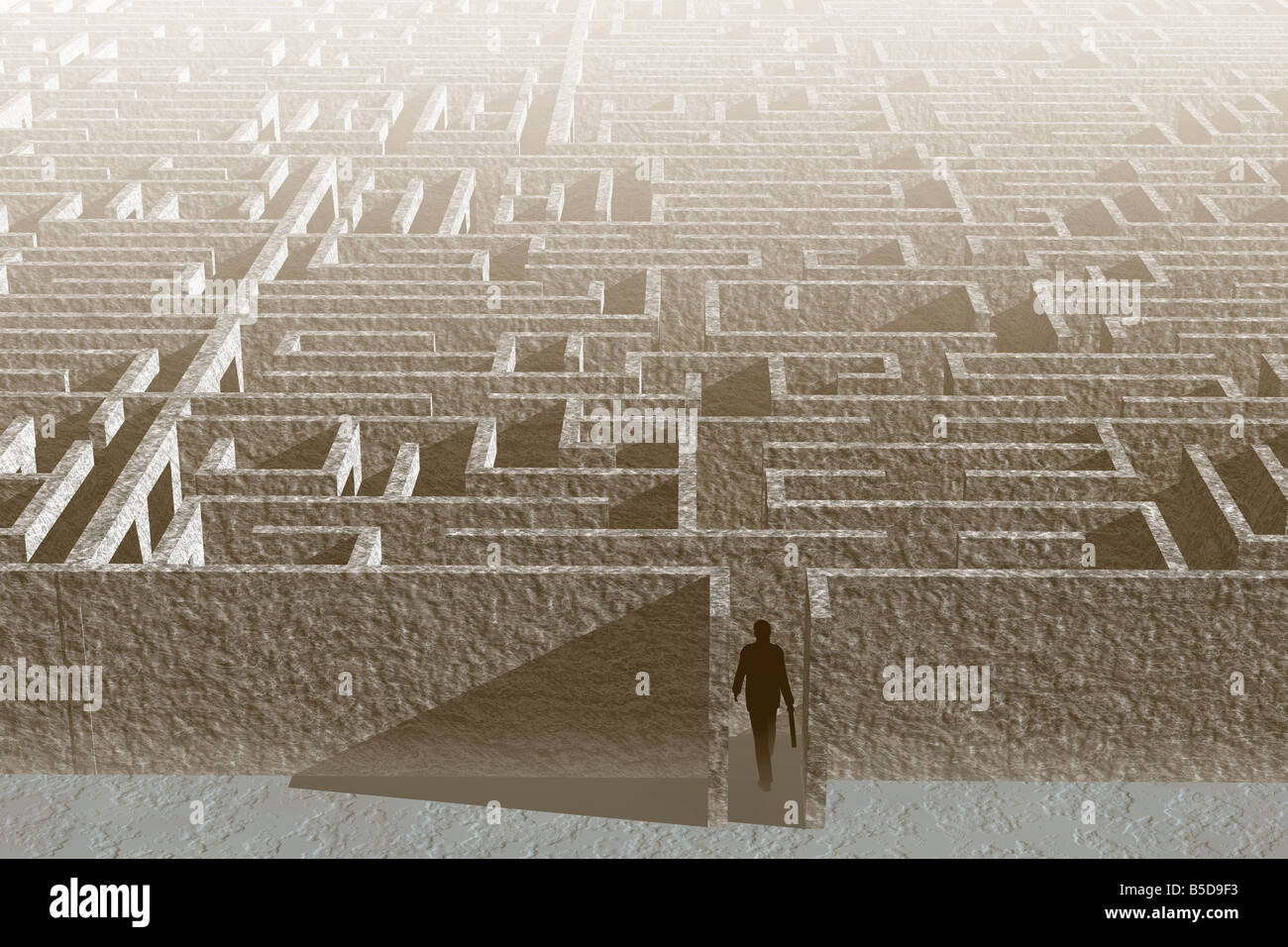 Businessman entering a maze Stock Photo - Alamy