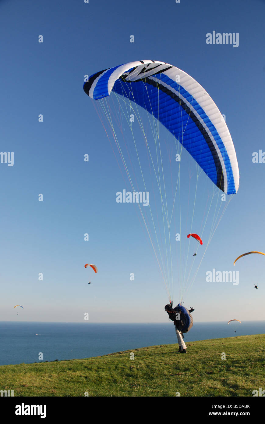 A paraglider about to take-off from a coastal location Stock Photo - Alamy