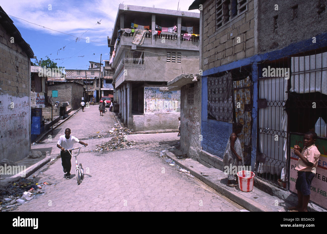 Street life in the middle of the St Martin bidonville or slum in Port ...