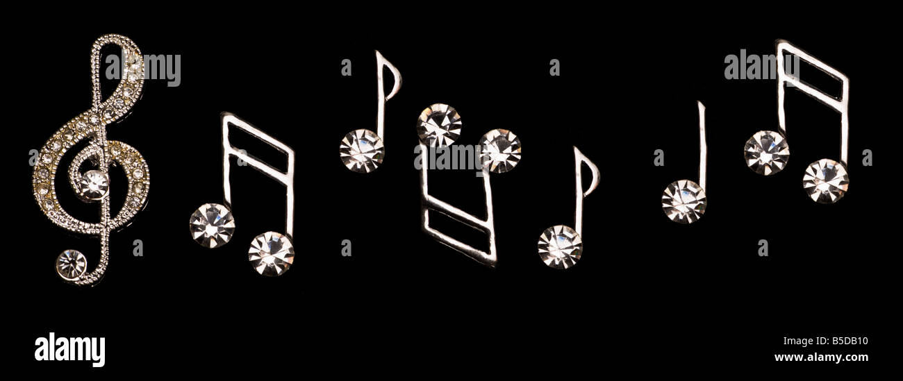 Musical notes and trebel clef in silver and diamonds Stock Photo - Alamy