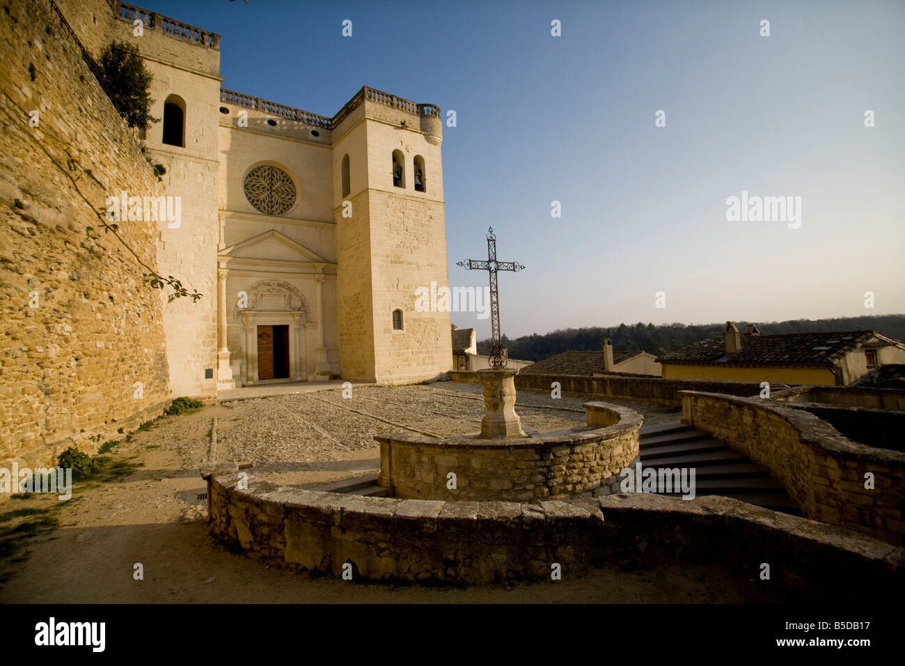 Grignan chateau. Church square. Iron cross. blue sky Horizontal 81104 ...