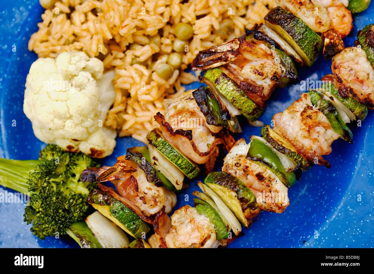 Plate of Grilled Shrimp Kebab Rice Broccoli and Cauliflower Stock Photo ...