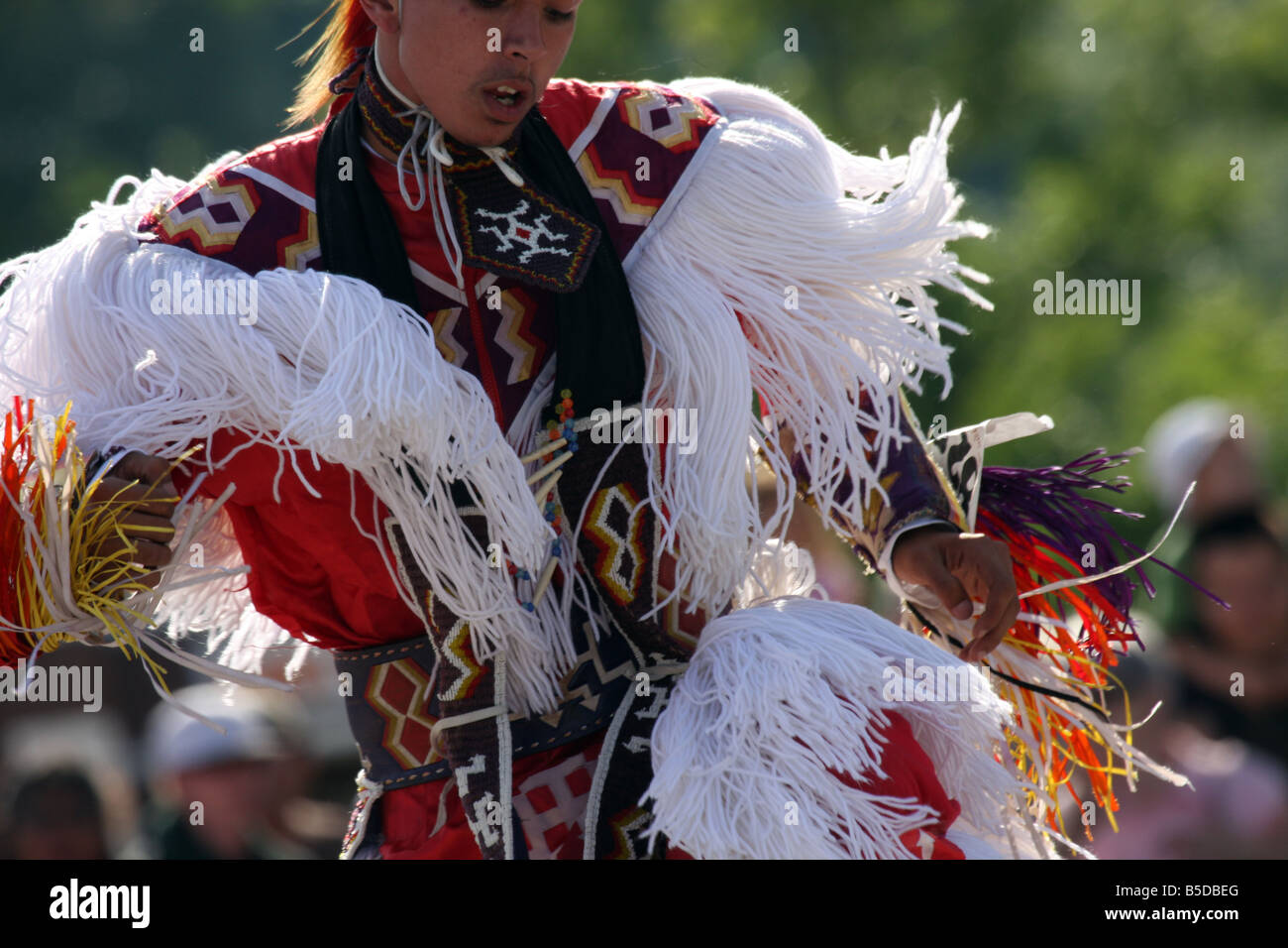 A teenager Native American Indian boy dancer at a Pow Wow at the ...
