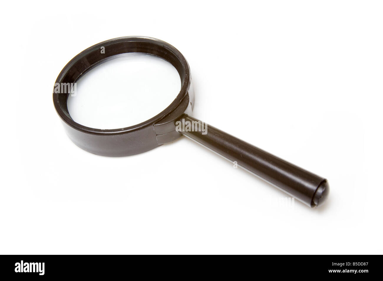 Magnifying glass isolated on a white studio background Stock Photo - Alamy