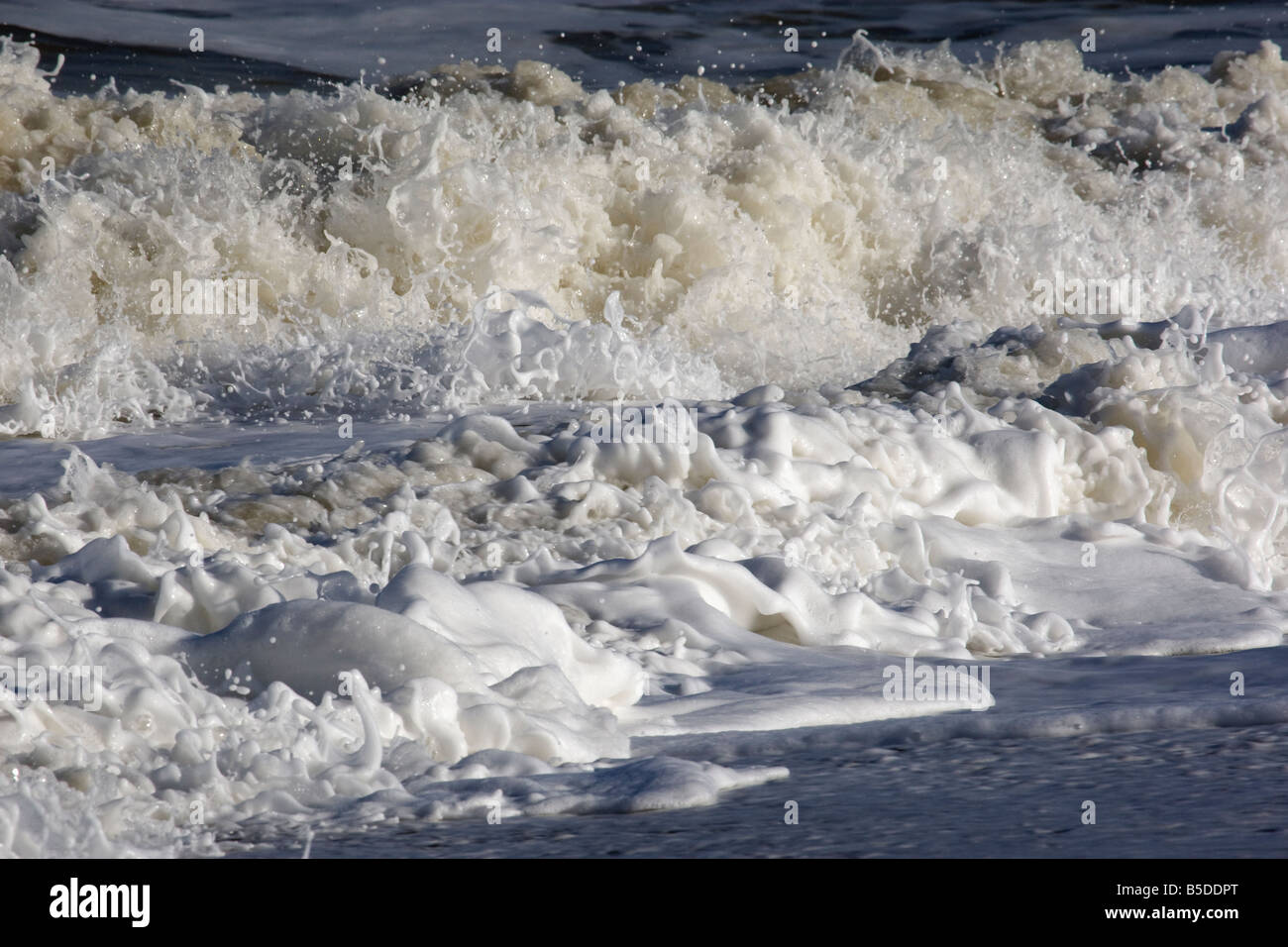 Waves breaking along coastline hi-res stock photography and images - Alamy