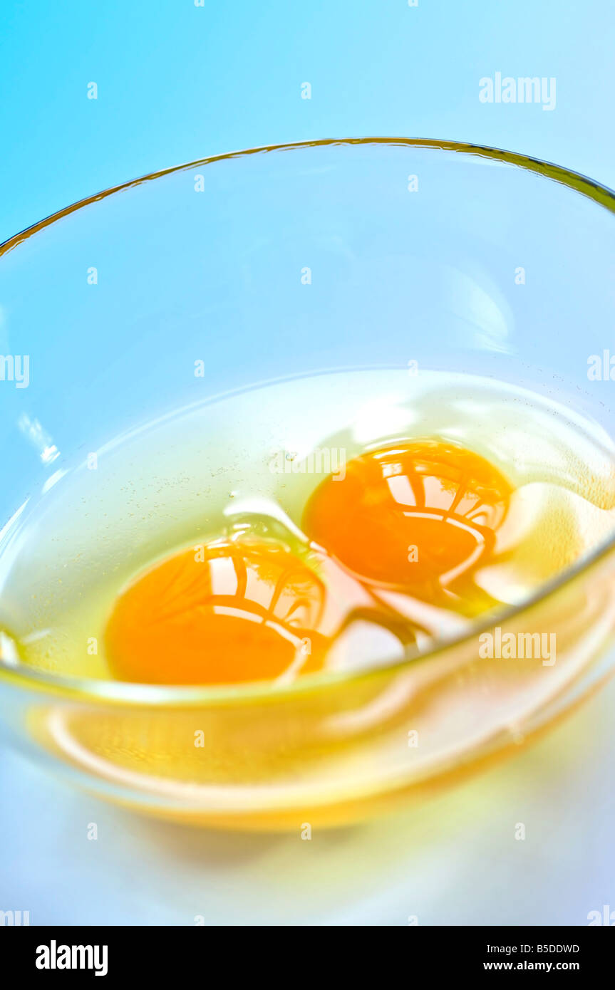 Two raw eggs yellow hi-res stock photography and images - Alamy
