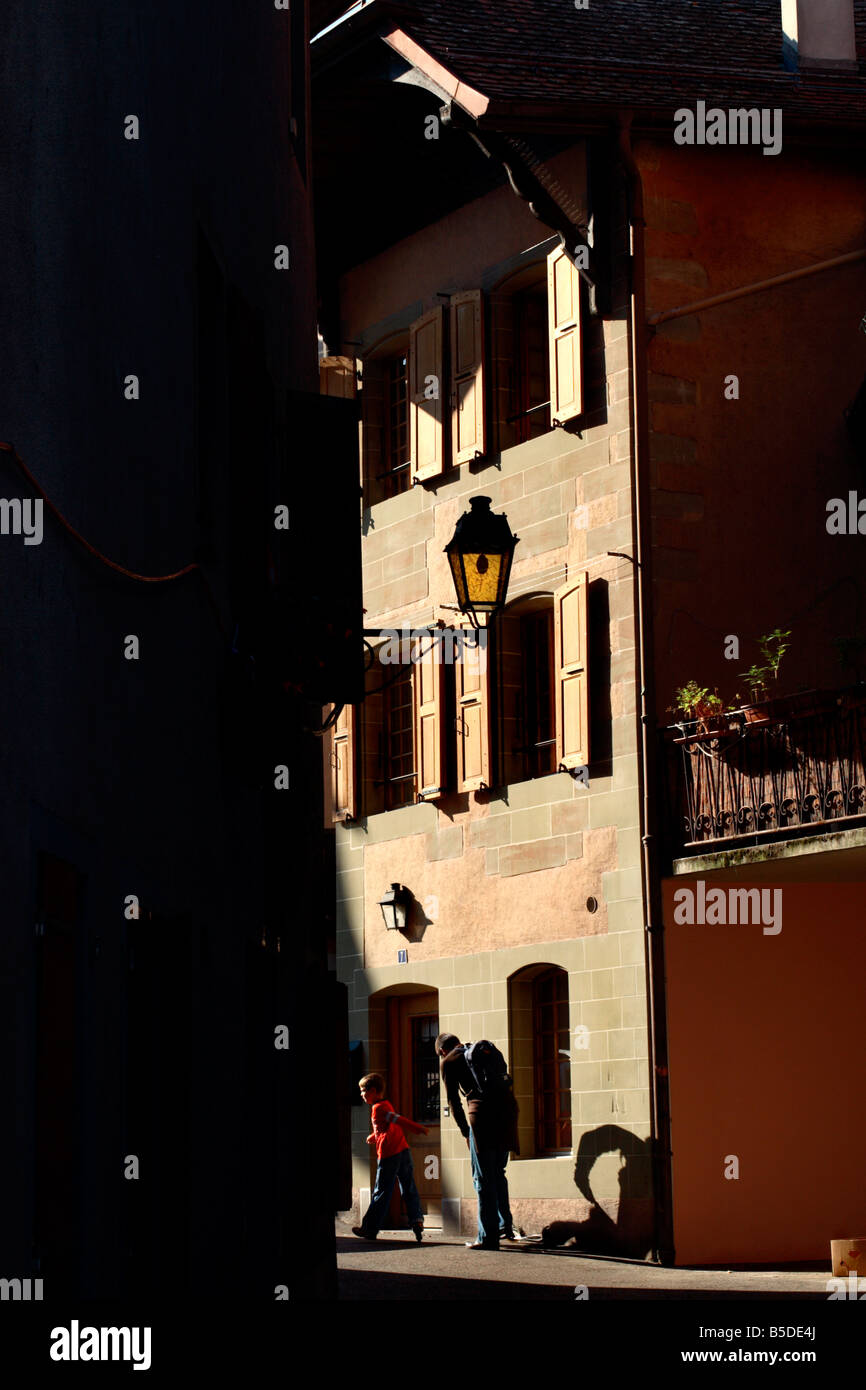 Man and boy outside house in Nyon, Switzerland Stock Photo - Alamy
