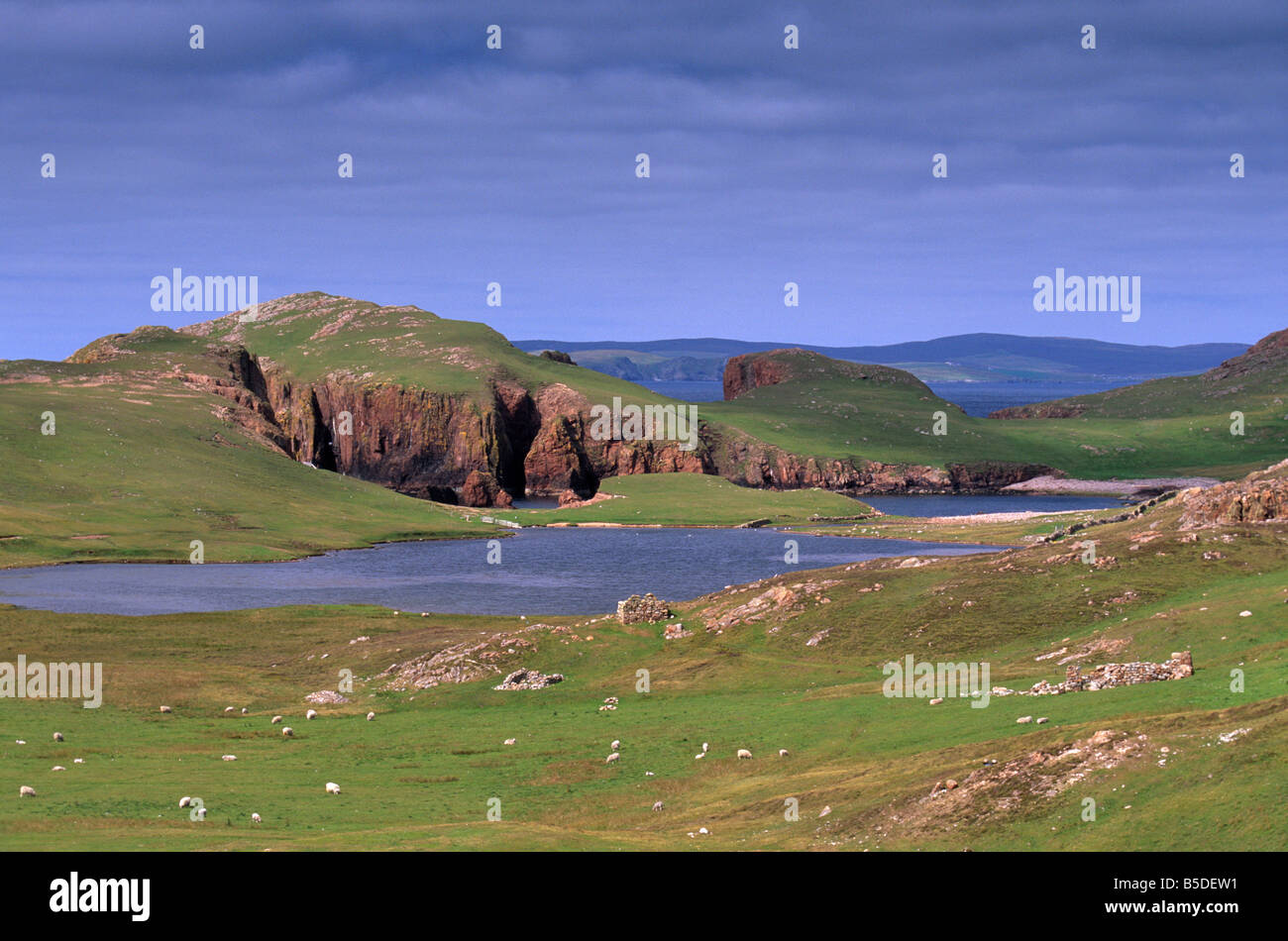 North Ham and Town loch, spectacular coastal scenery of red granite, on ...